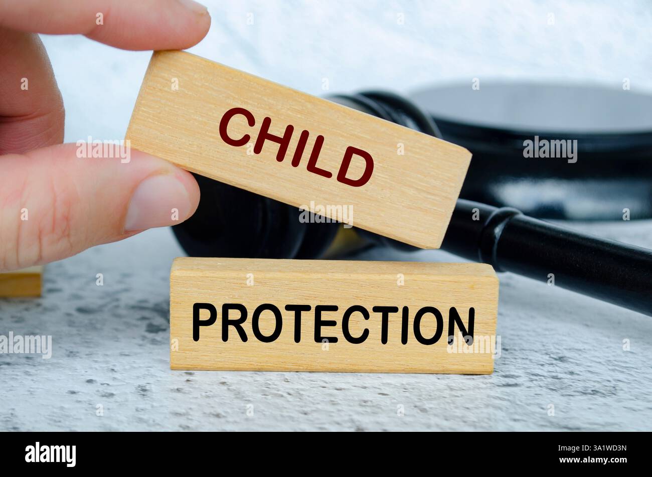 Child Protection text on wooden blocks with lawyer gavel background ...