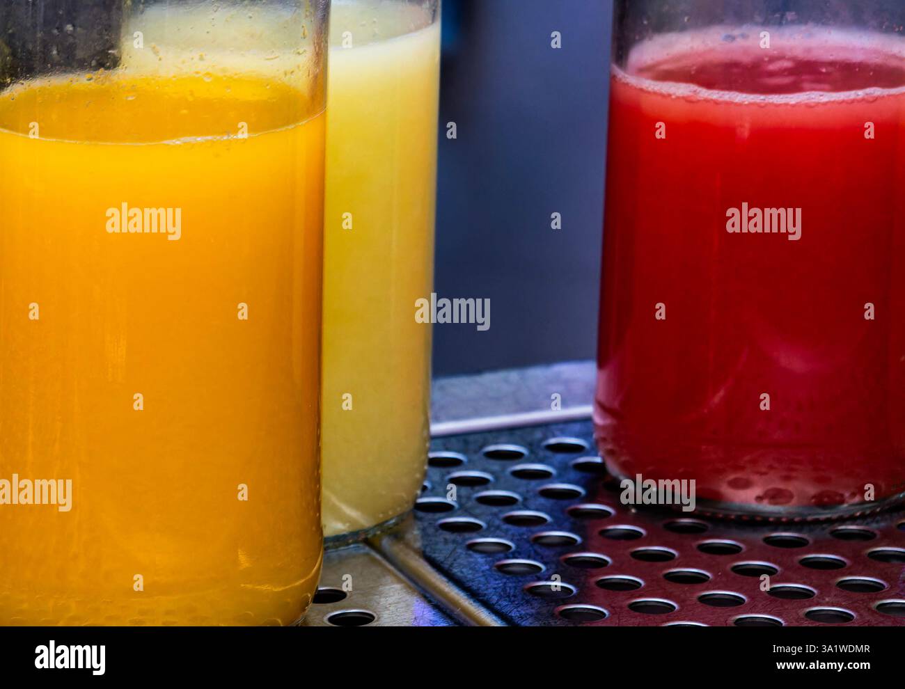 Colorful liquid drinks on a bar Stock Photo - Alamy