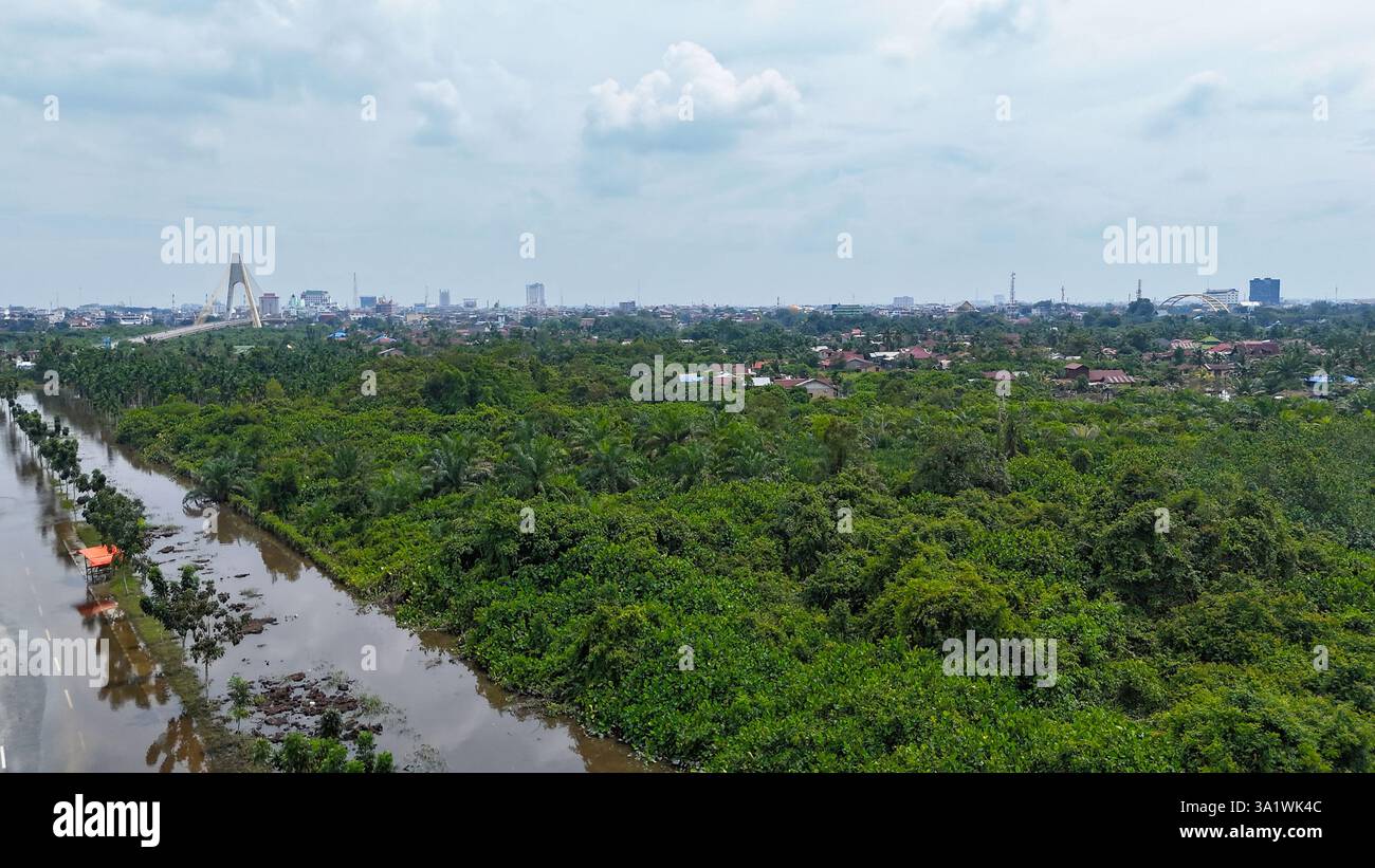 Riau, Indonesia - March 8, 2025: Aerial view of flooding on Jalan ...
