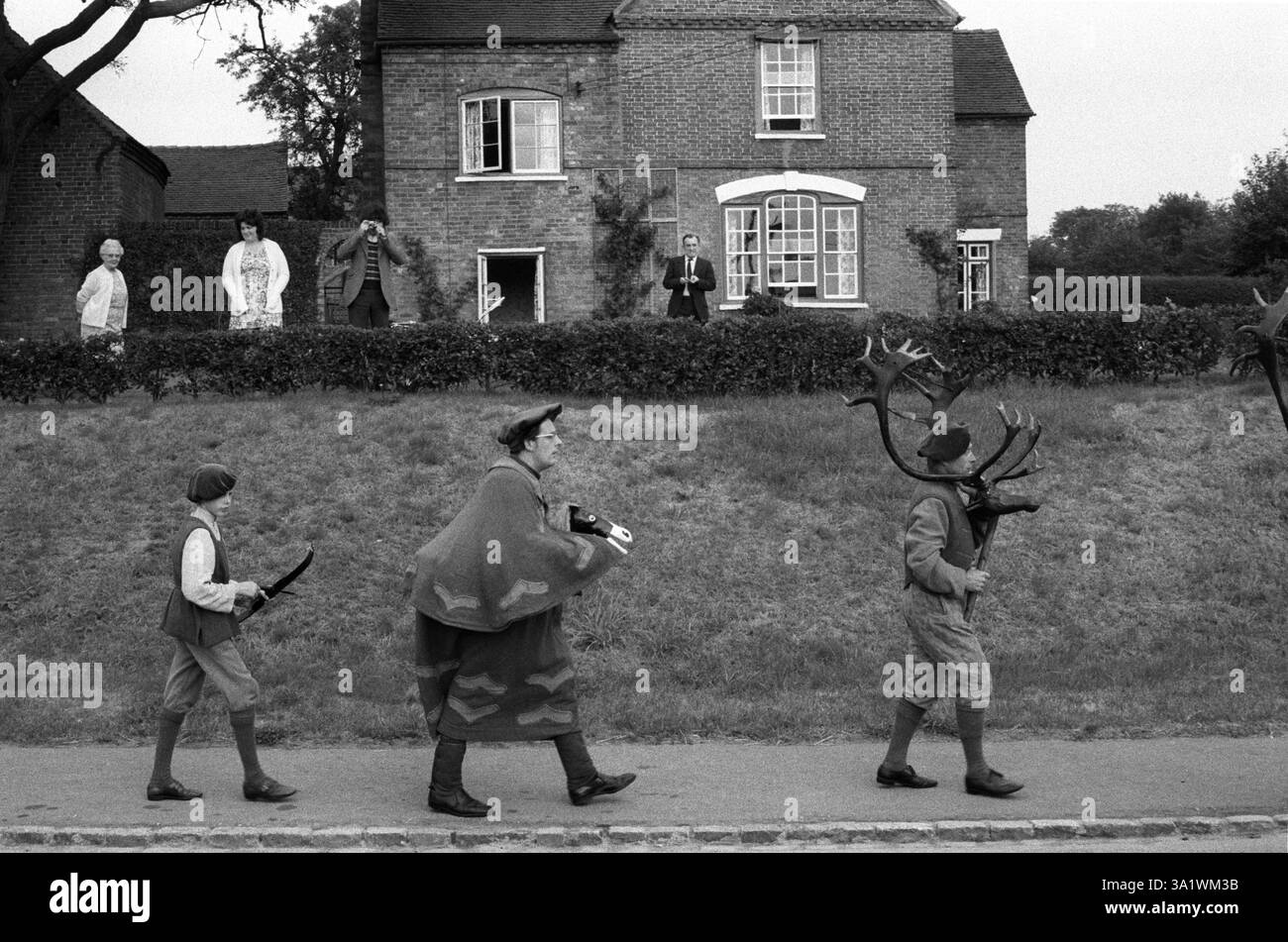 Abbots Bromley Horn Dance 1970s UK.Boy with Bow and Arrow, Hobby Horse ...