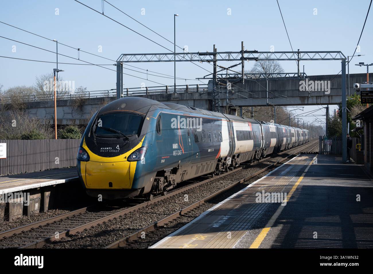 Avanti West Coast Pendolino electric train passing through Tile Hill ...