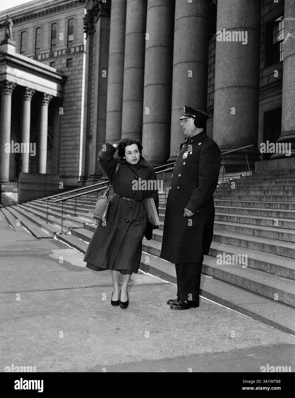 Judith Coplon during a recess of her espionage trial outside Federal ...