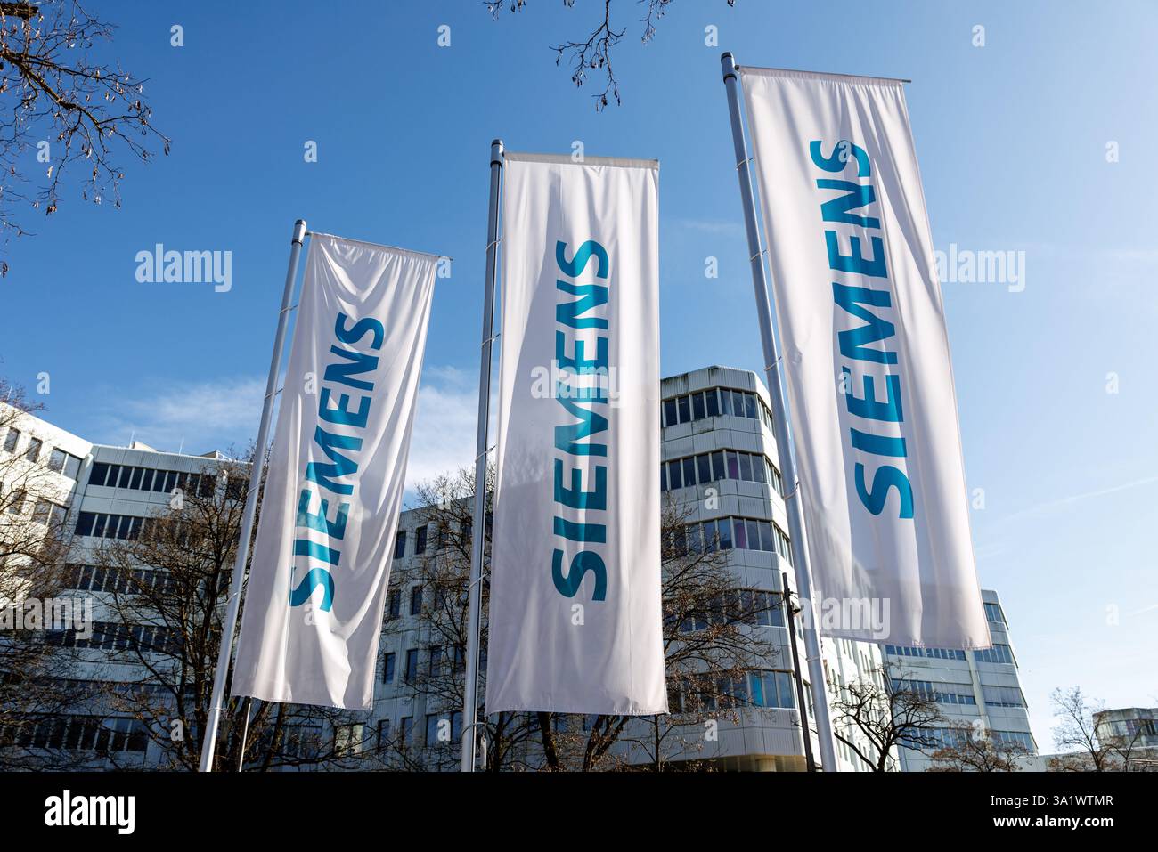 Munich, Germany. 09th Mar, 2025. The Siemens lettering and logo can be seen on flags in front of ...
