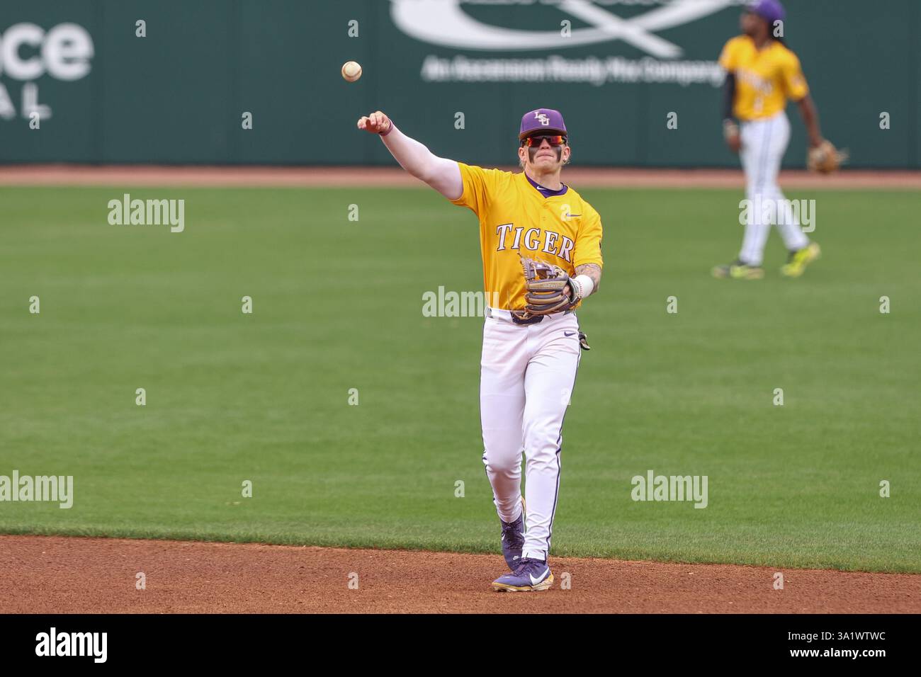 March 9, 2025: LSU's Daniel Dickinson (14) makes a throw to first base ...