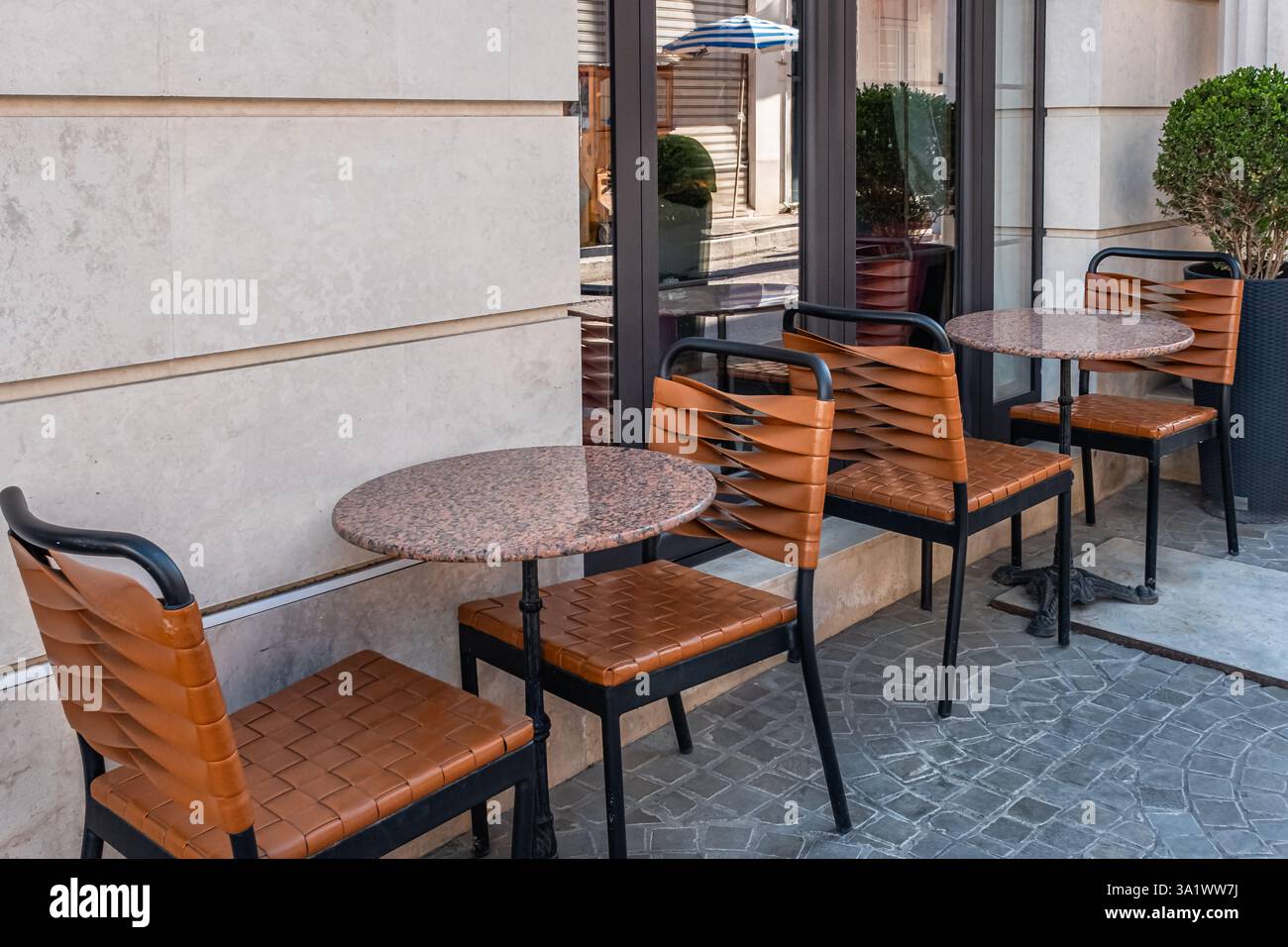 Old fashioned street cafe terrace. View of empty outdoor cafe in Europe ...