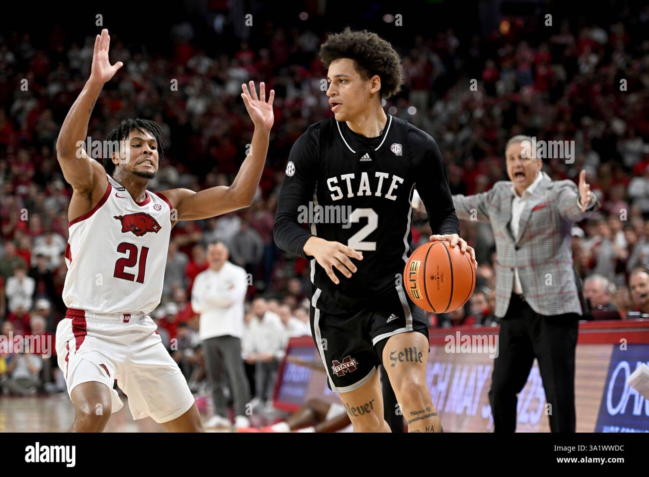 Mississippi State guard Riley Kugel (2) tries to drive past Arkansas ...
