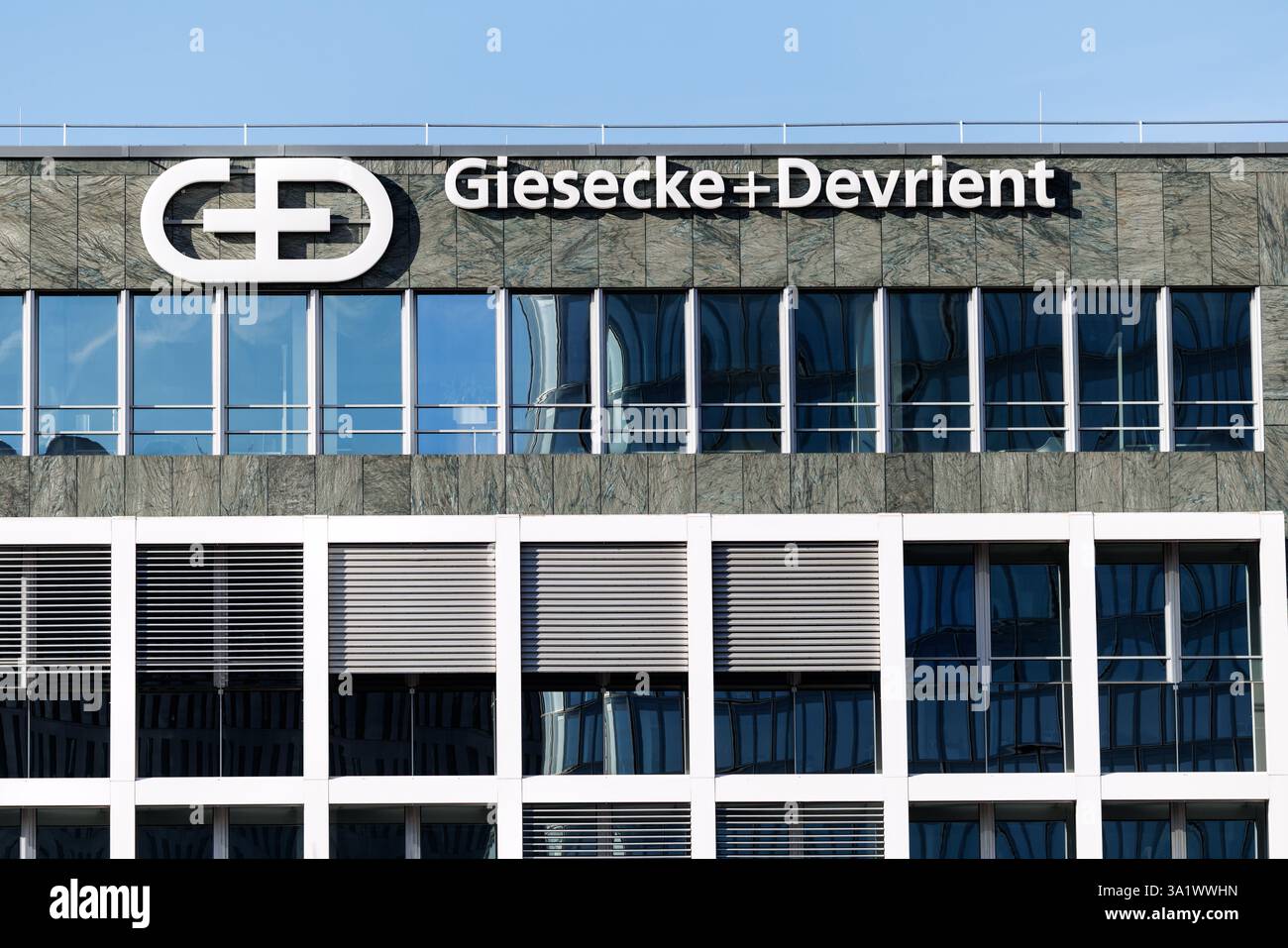09 March 2025, Bavaria, Munich: The logo and lettering of Giesecke+Devrient GmbH (G+D) can be ...