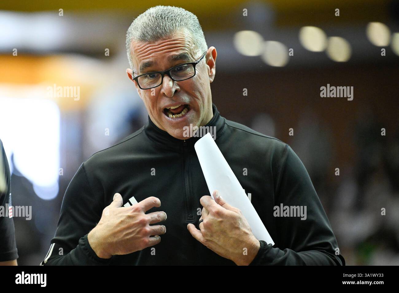 North Alabama head coach Tony Pujol talks to an official during the ...