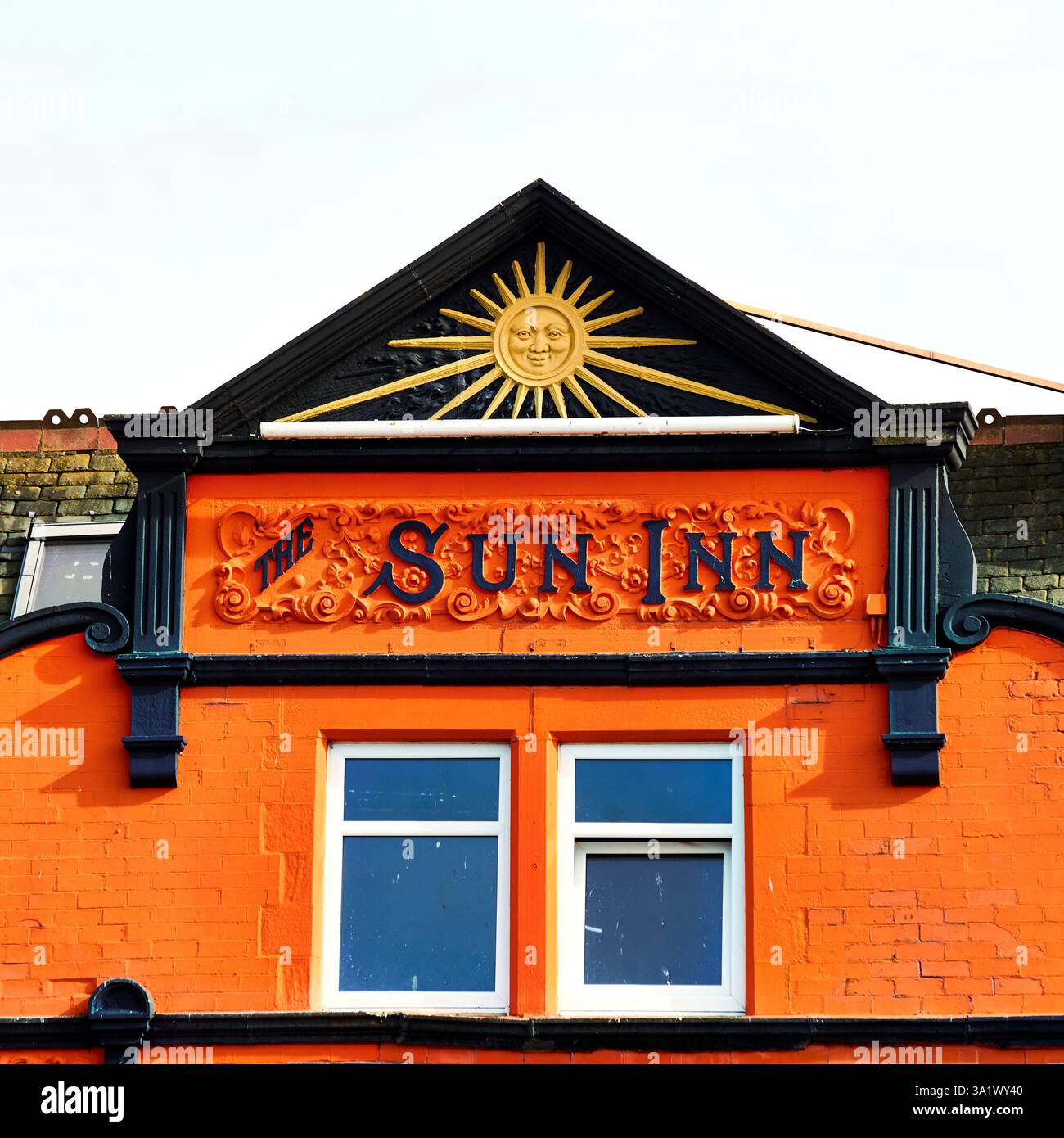 Orange coloured sign above the Sun Inn in Blackpool,UK Stock Photo - Alamy