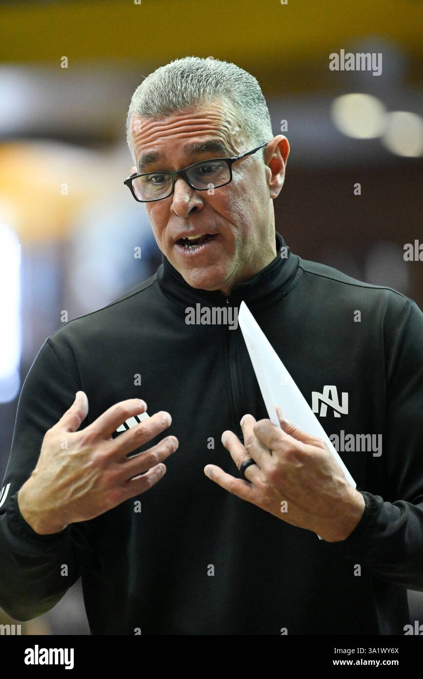 North Alabama head coach Tony Pujol talks to an official during the ...