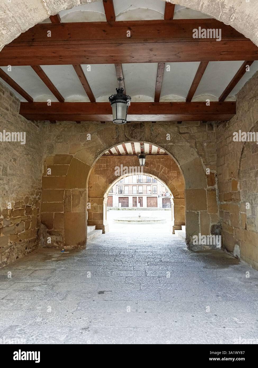 Stone archway with wooden beams in Santo Domingo de la Calzada, La ...