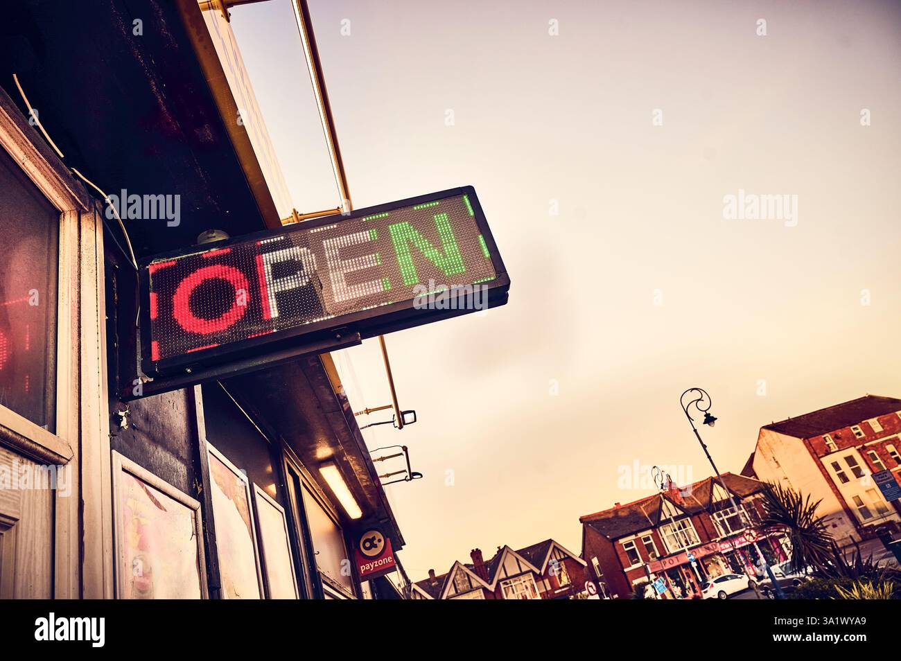 Neon open sign over shop door Stock Photo - Alamy