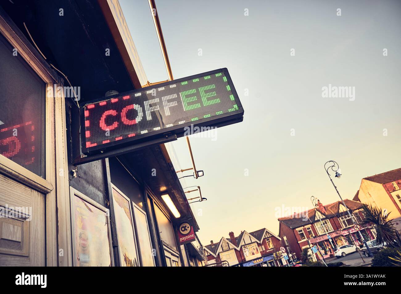 Neon coffee sign over shop door Stock Photo - Alamy