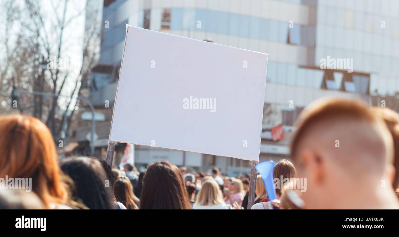Blank placard mockup on political protest, selective focus Stock Photo ...