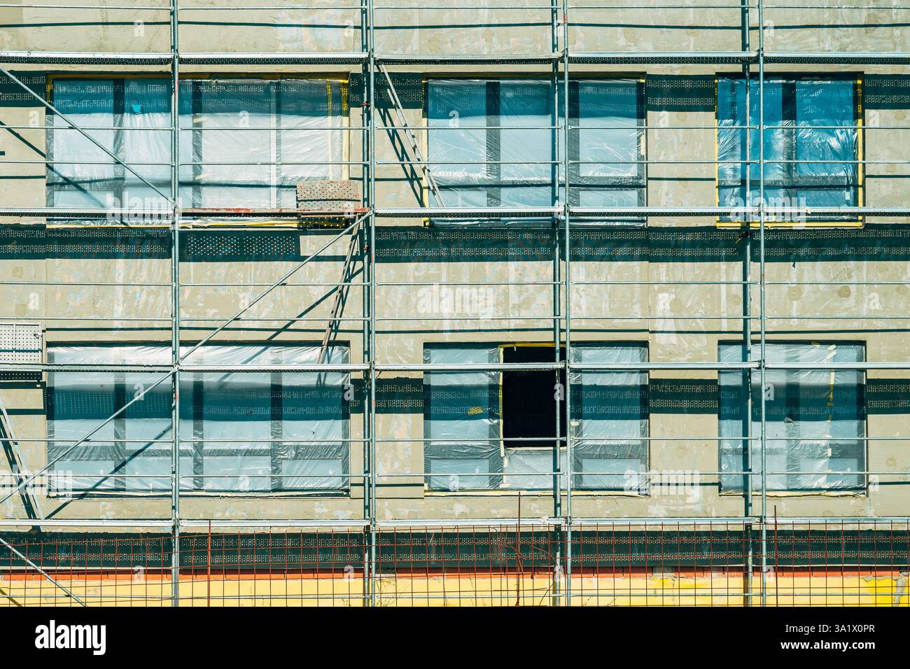 Scaffolding structure on two storey building construction site ...