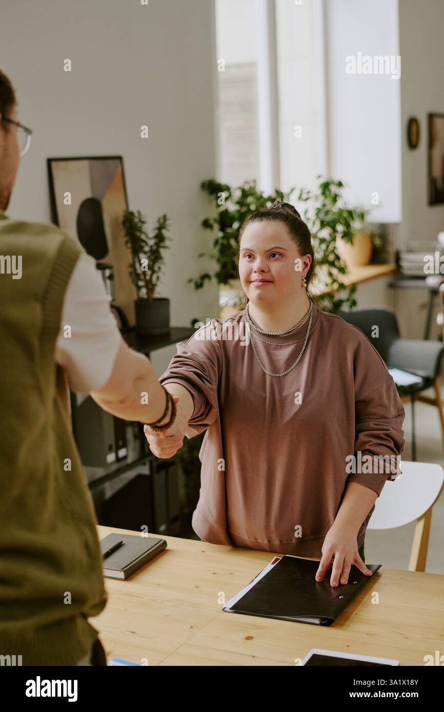 Vertical high angle shot of unrecognizable tall job interviewer shaking ...