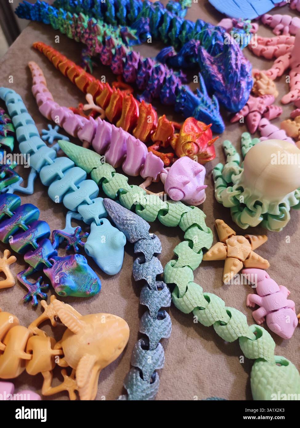 Creative multicolored models printed on 3D printer from molten plastic ...