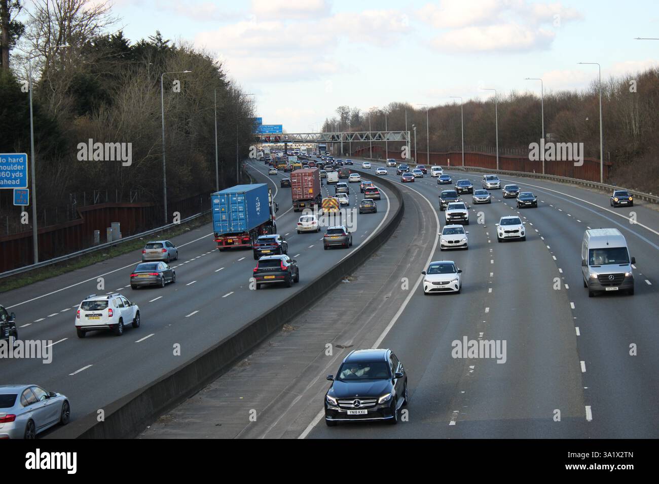 Speeding Traffic on the M25 Smart Motorway round soft bend heading ...