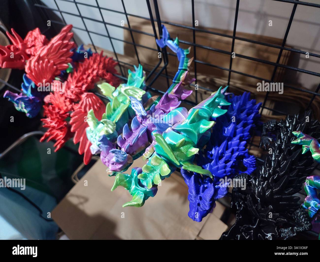 Creative multicolored models printed on 3D printer from molten plastic ...