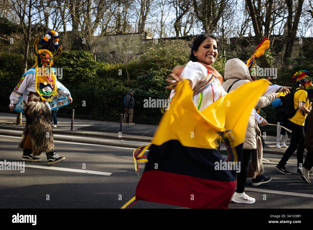 Paris, France. 2nd Mar, 2025. Equatorians performers parade during the ...