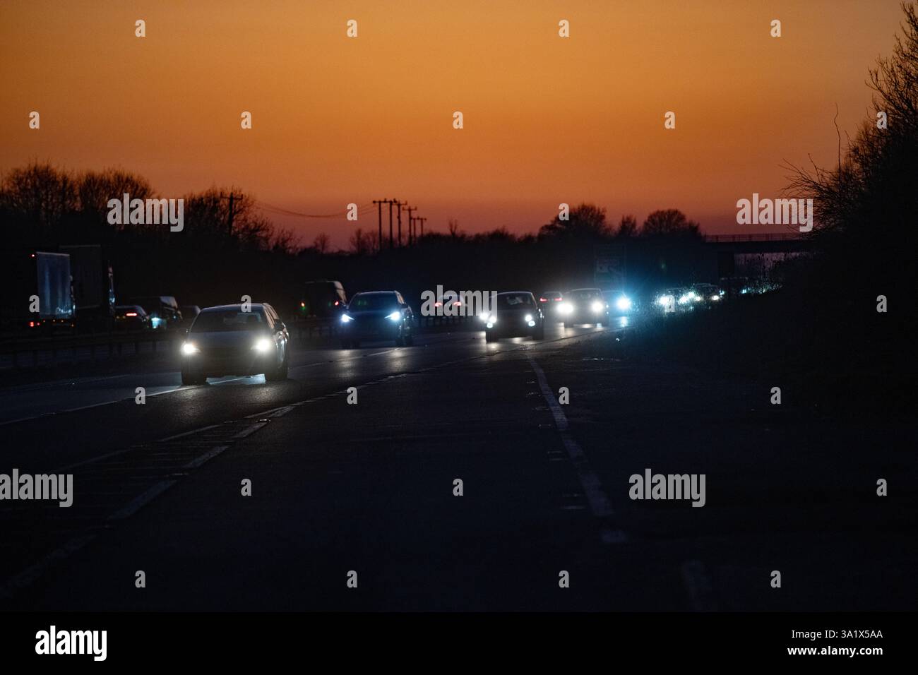Driving at Dusk March 2025 Stock Photo - Alamy
