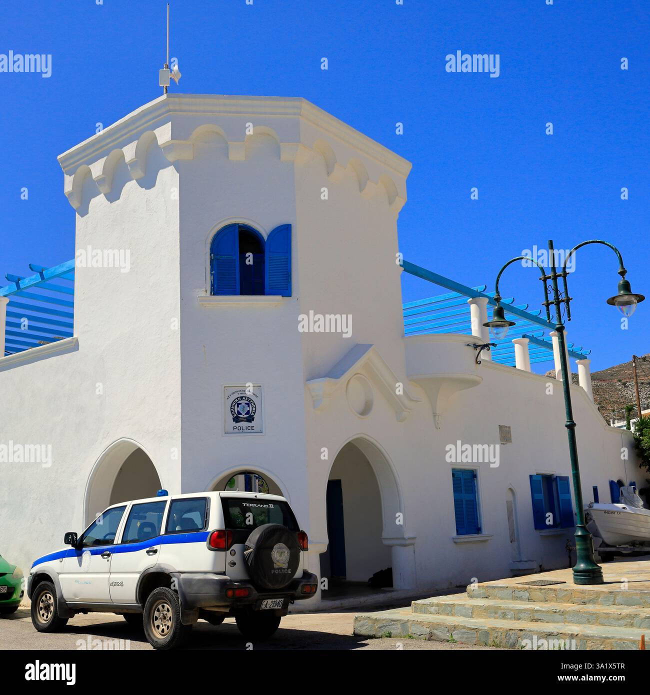 Italianate police station and police car, Livadia village, Tilos island ...