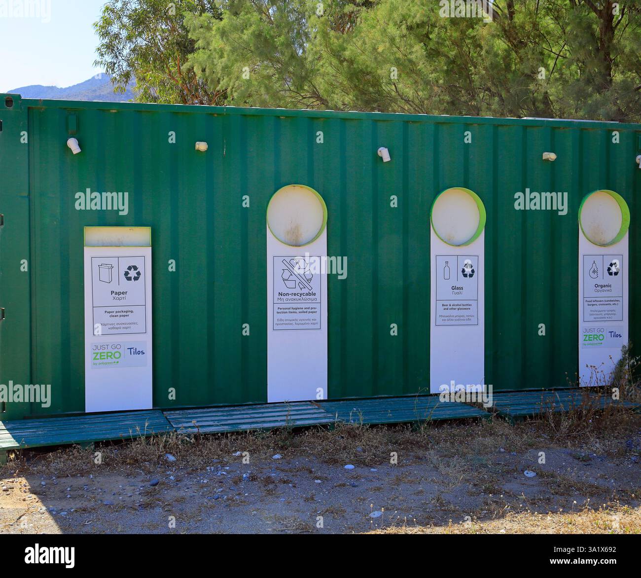 Recycling point steel container at Eristos beach, Tilos Island ...