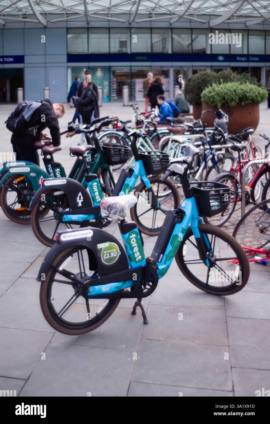 Forest electric bike hire outside Kings Cross Station in London Stock ...