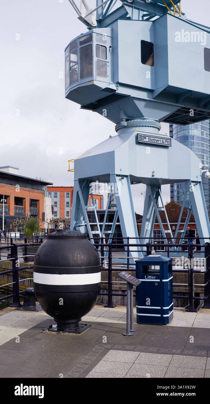 Sea mine next to large crane inn Gunwharf Quays, Portsmouth Stock Photo ...