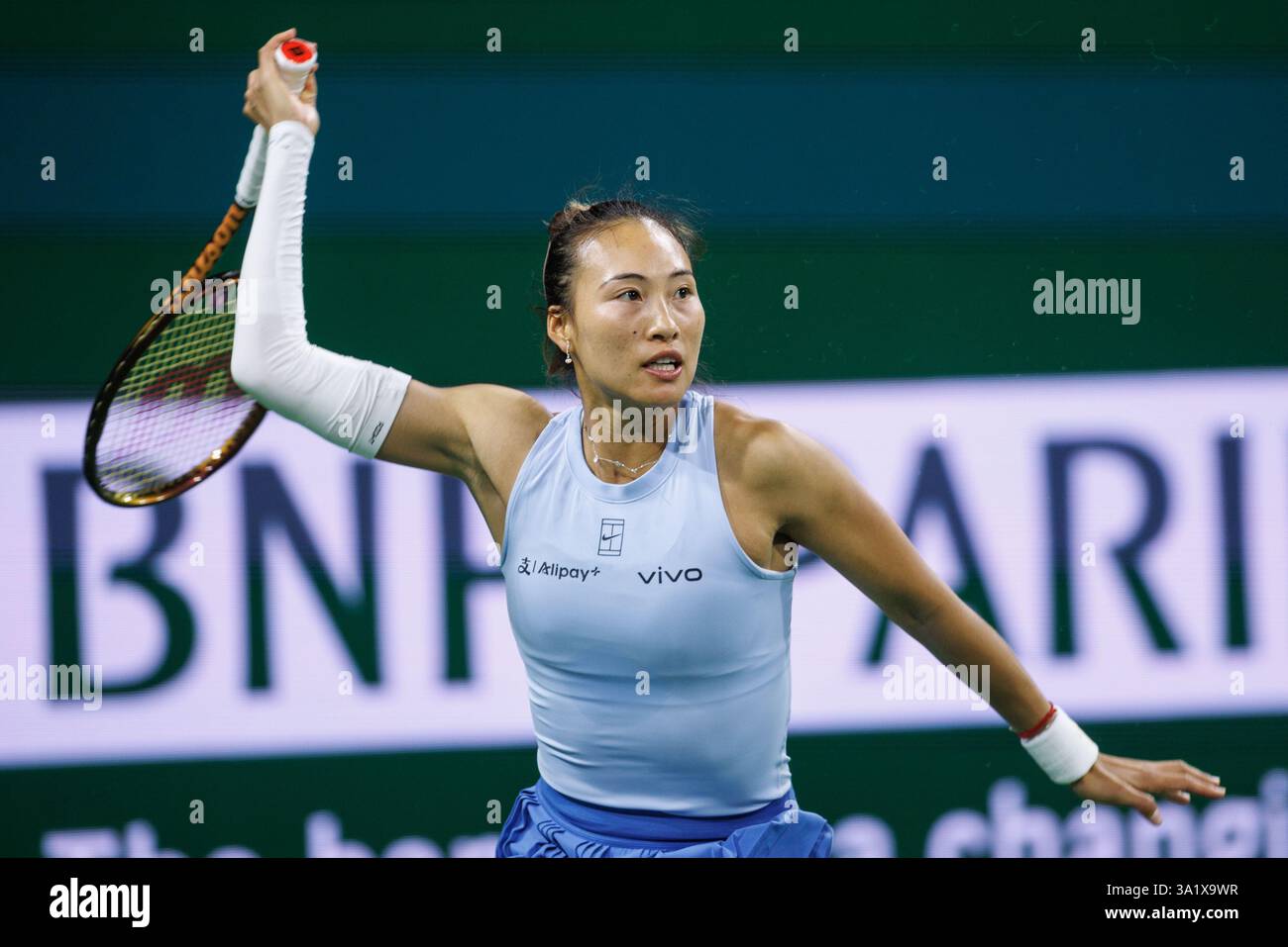 Indian Wells, California, USA. 9th Mar, 2025. Qinwen Zheng (CHN) hits a shot against Lulu Sun ...