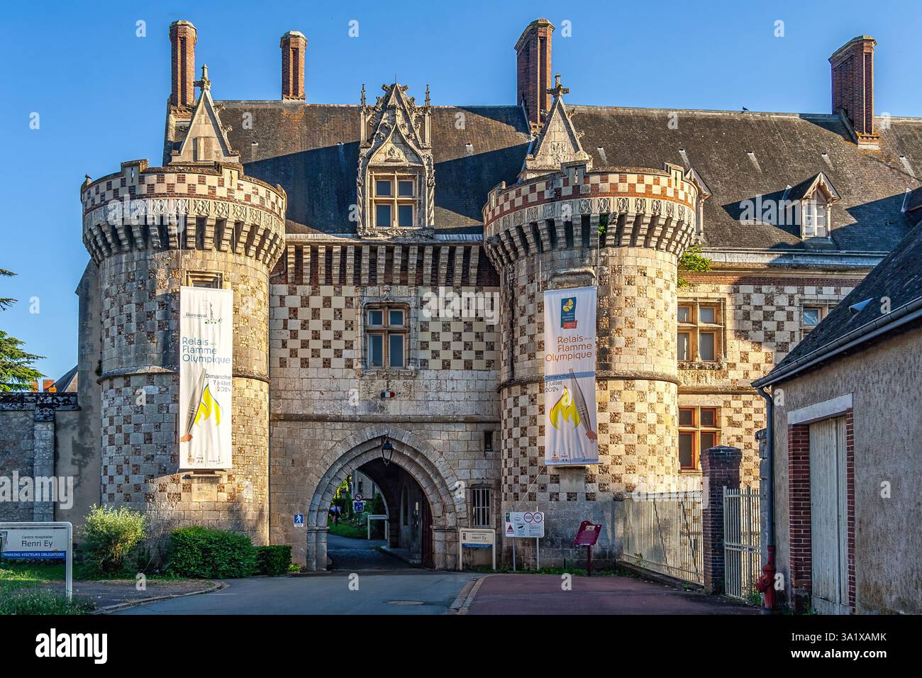 The entrance to the former Abbey of Saint-Florentin stands majestically ...
