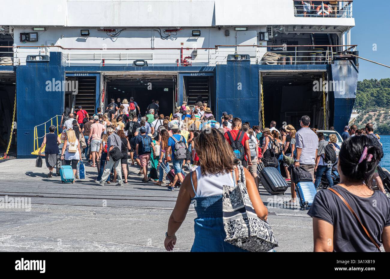Travellers at harbour Boarding a Ferry Stock Photo - Alamy