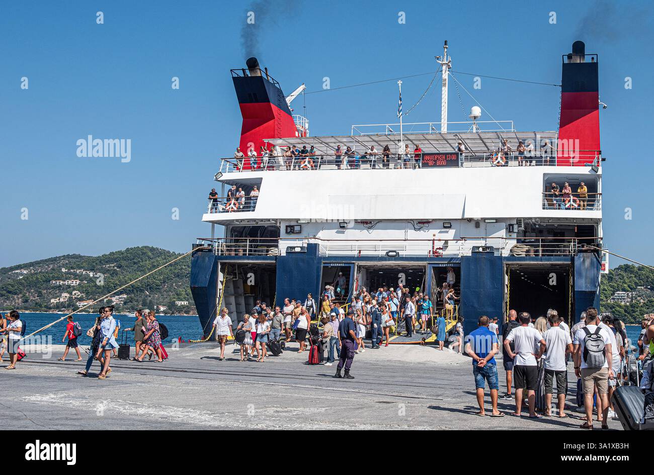 Travellers at harbour Boarding a Ferry Stock Photo - Alamy
