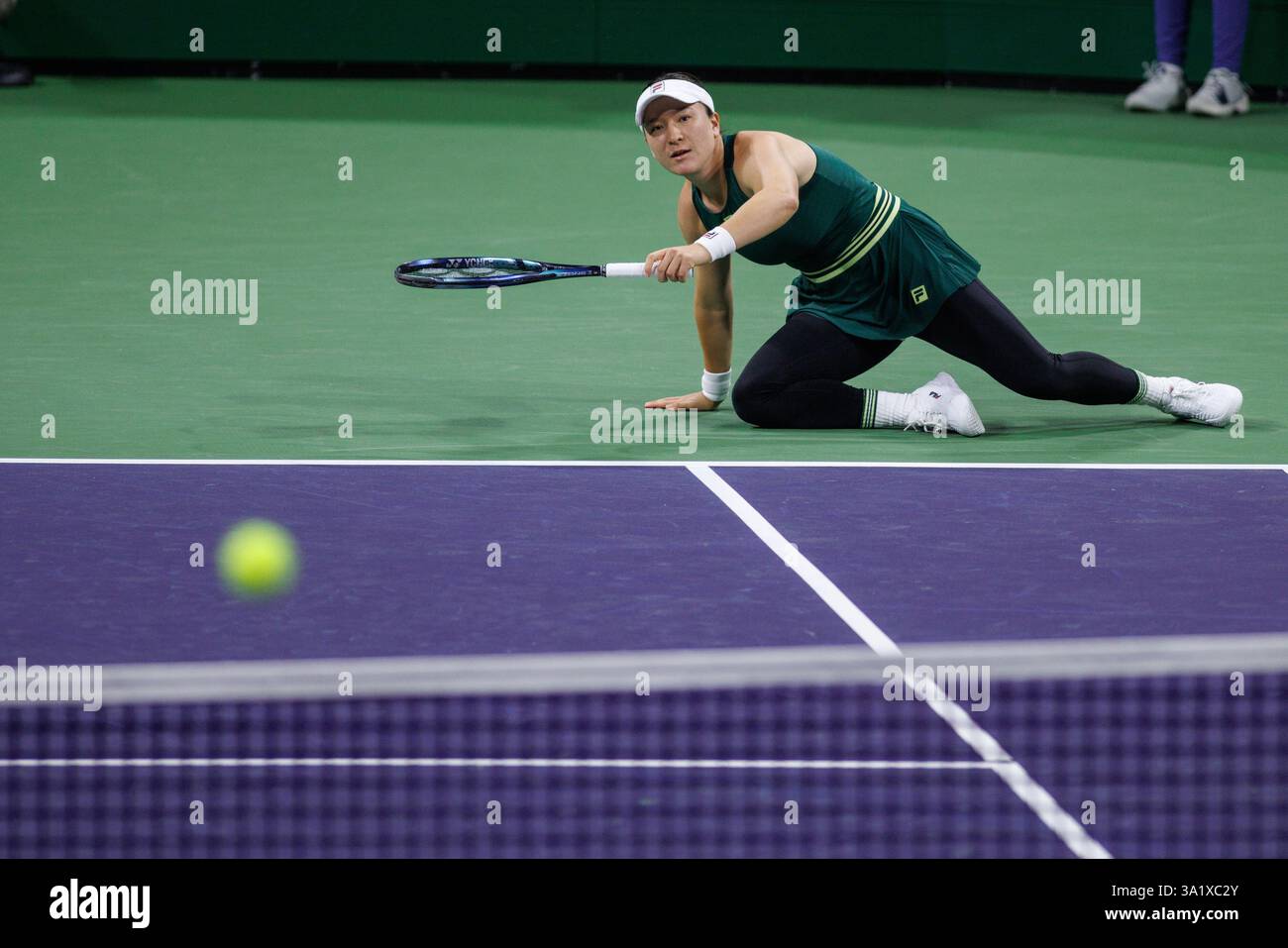 Indian Wells, California, USA. 9th Mar, 2025. Lulu Sun (NZL) falls to the ground during her ...