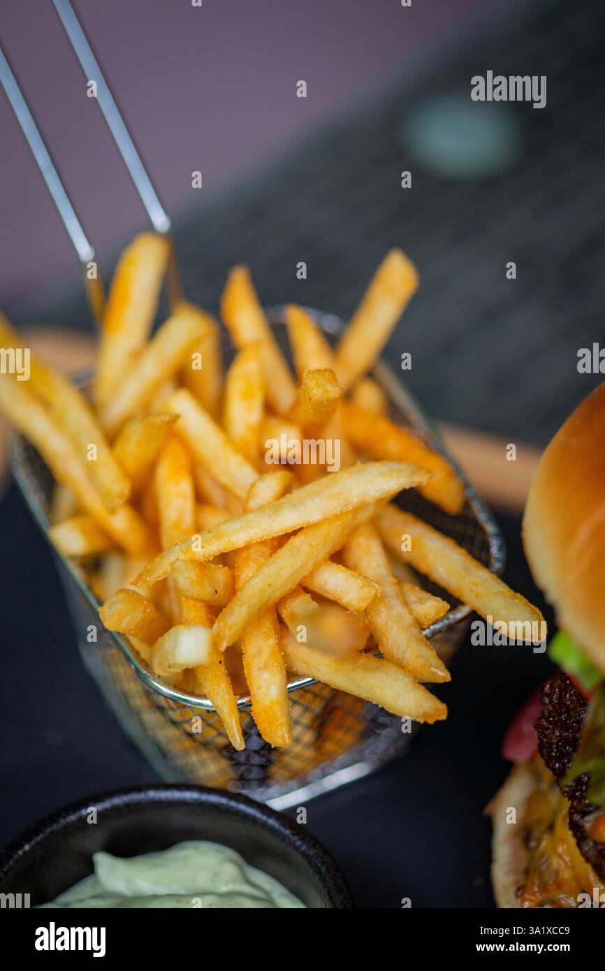 delicious crispy gourmet fries ready to eat Stock Photo - Alamy