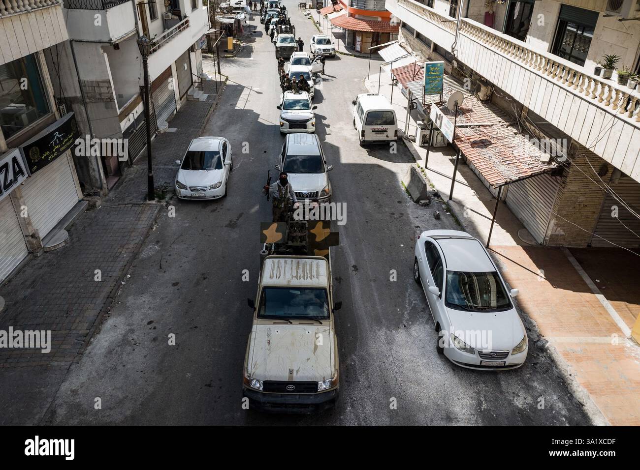 10 March 2025, Syria, Jableh: Members of the Syrian security forces ...