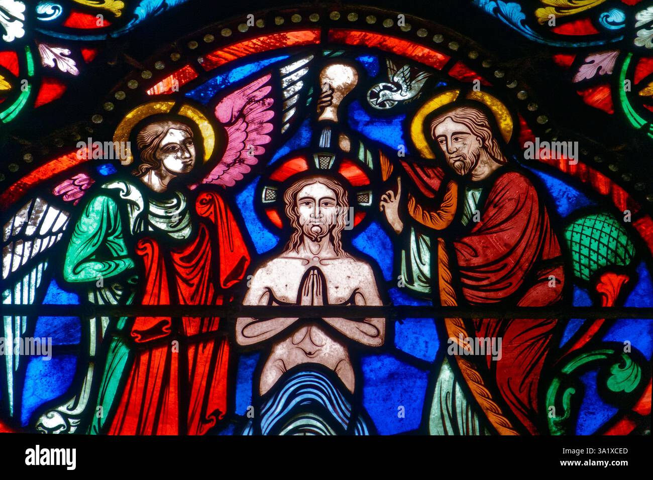 Dijon, FRANCE - 01-30-2025: Stained glass (19th century) of Baptism of ...
