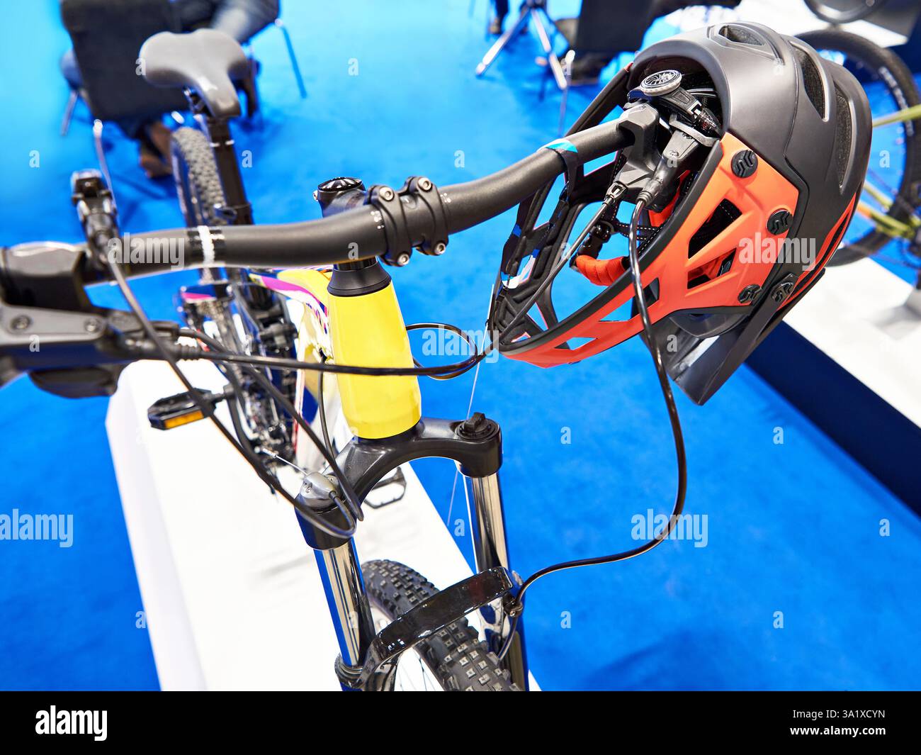 Safety helmet and sports bicycle Stock Photo - Alamy