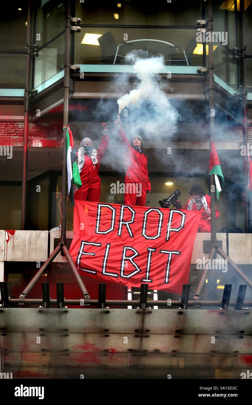London, England, UK. 10th Mar, 2025. Activists occupy the office roof ...