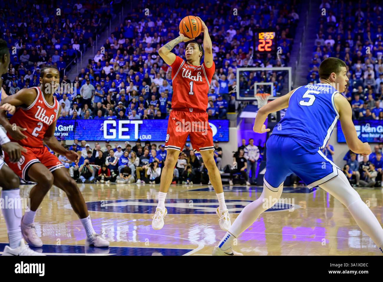 Utah guard Miro Little (1) shoots the basketball during the first half ...