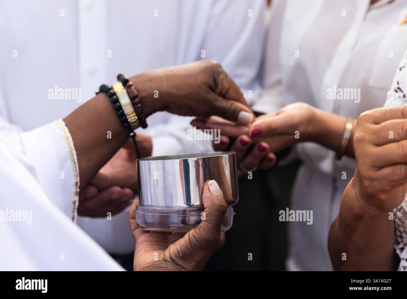 Catholics are seen receiving the host during mass on the last Friday of ...