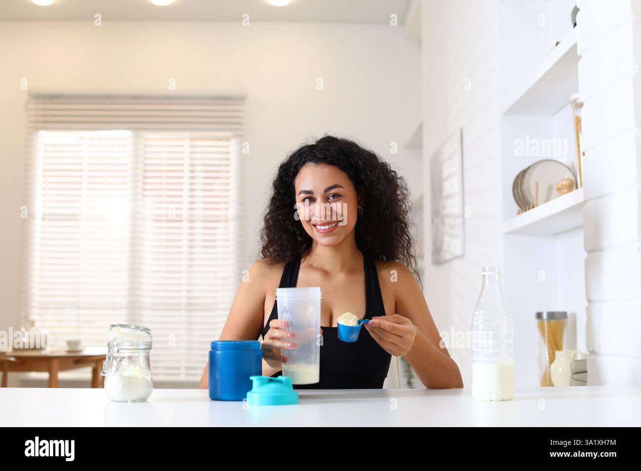 Beautiful woman making protein hi-res stock photography and images - Alamy