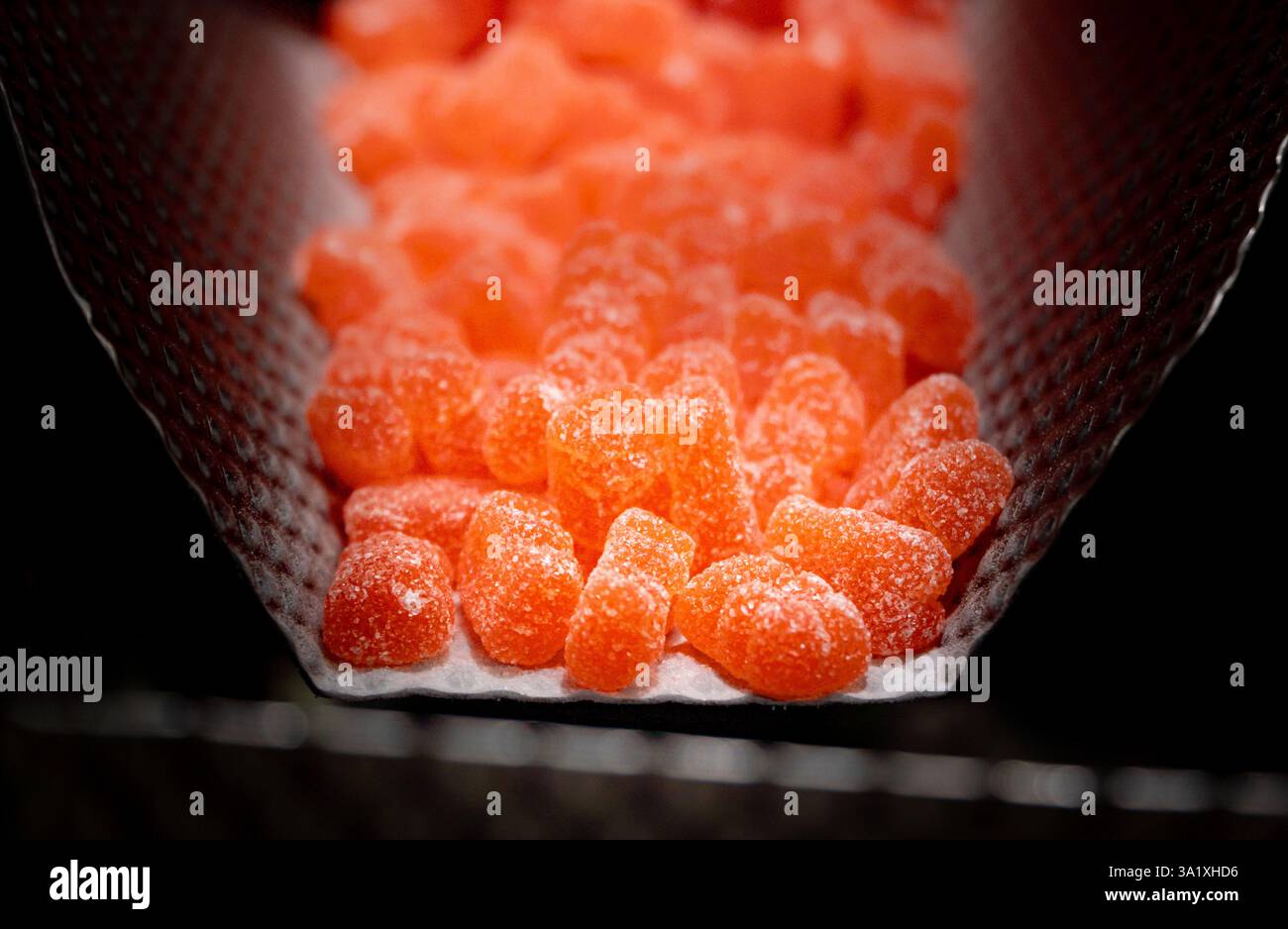 Manufacturing process of vitamins supplement orange gummy bears Stock ...