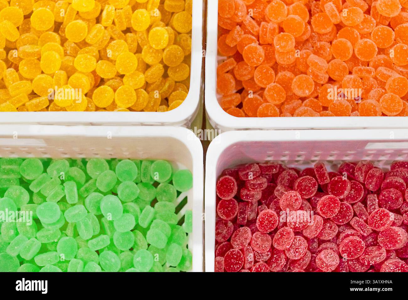 Factory boxes with variety of colourful industrial gummy Stock Photo ...