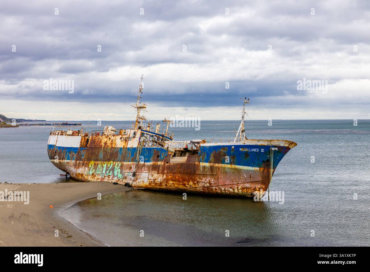 Ships on a shore of Straight of Magellan in Chile, Magallanes and ...