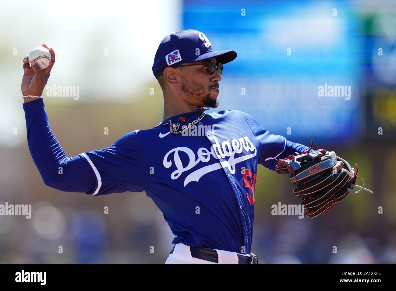 Los Angeles Dodgers shortstop Mookie Betts warms up prior to a spring ...