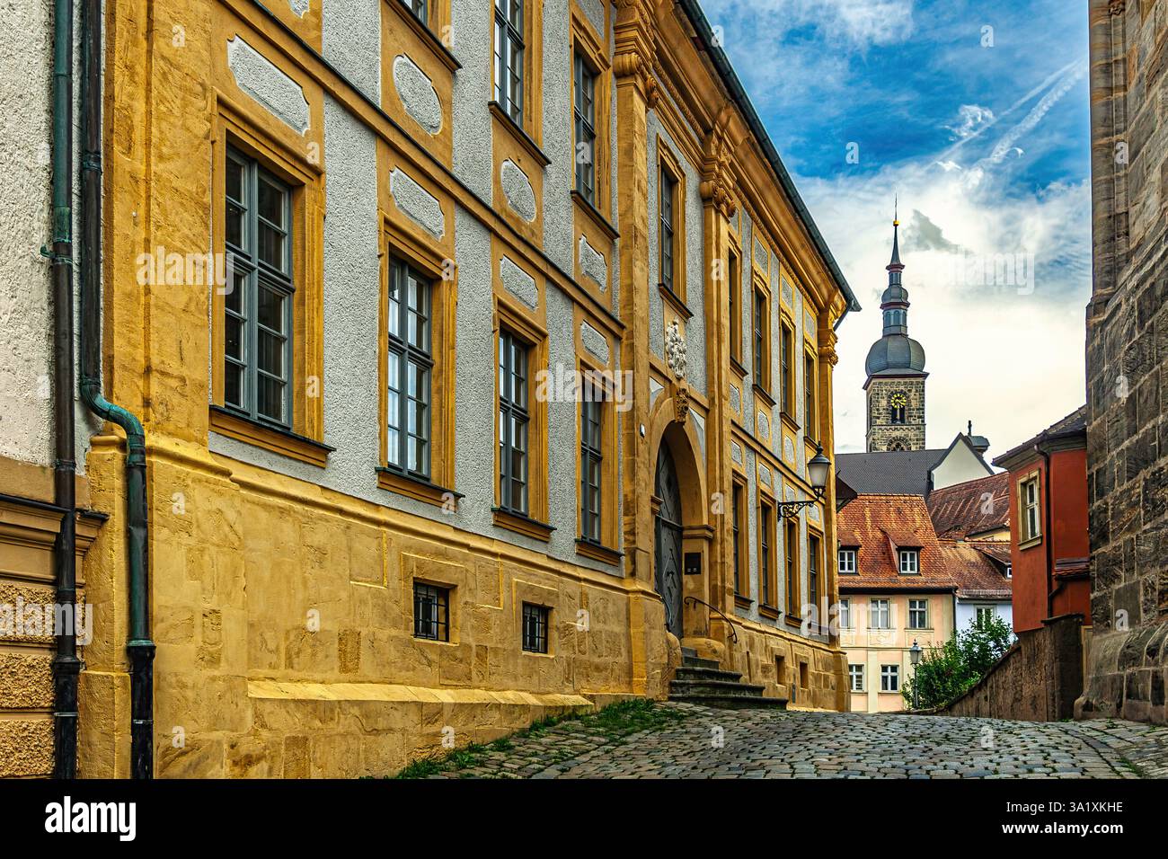 Cobbled alley along medieval houses and the urban charm of Bamberg, in ...
