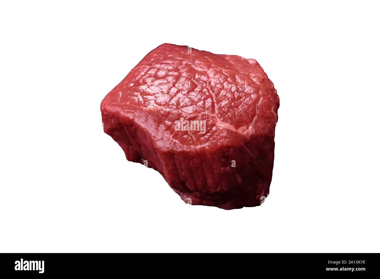 Raw beef tenderloin ribeye steak with salt and spices on a white ...