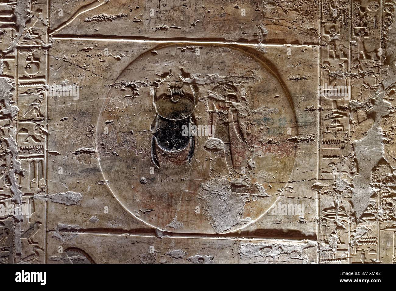 This scene on the southeast wall of KV17 shows the solar disk ...