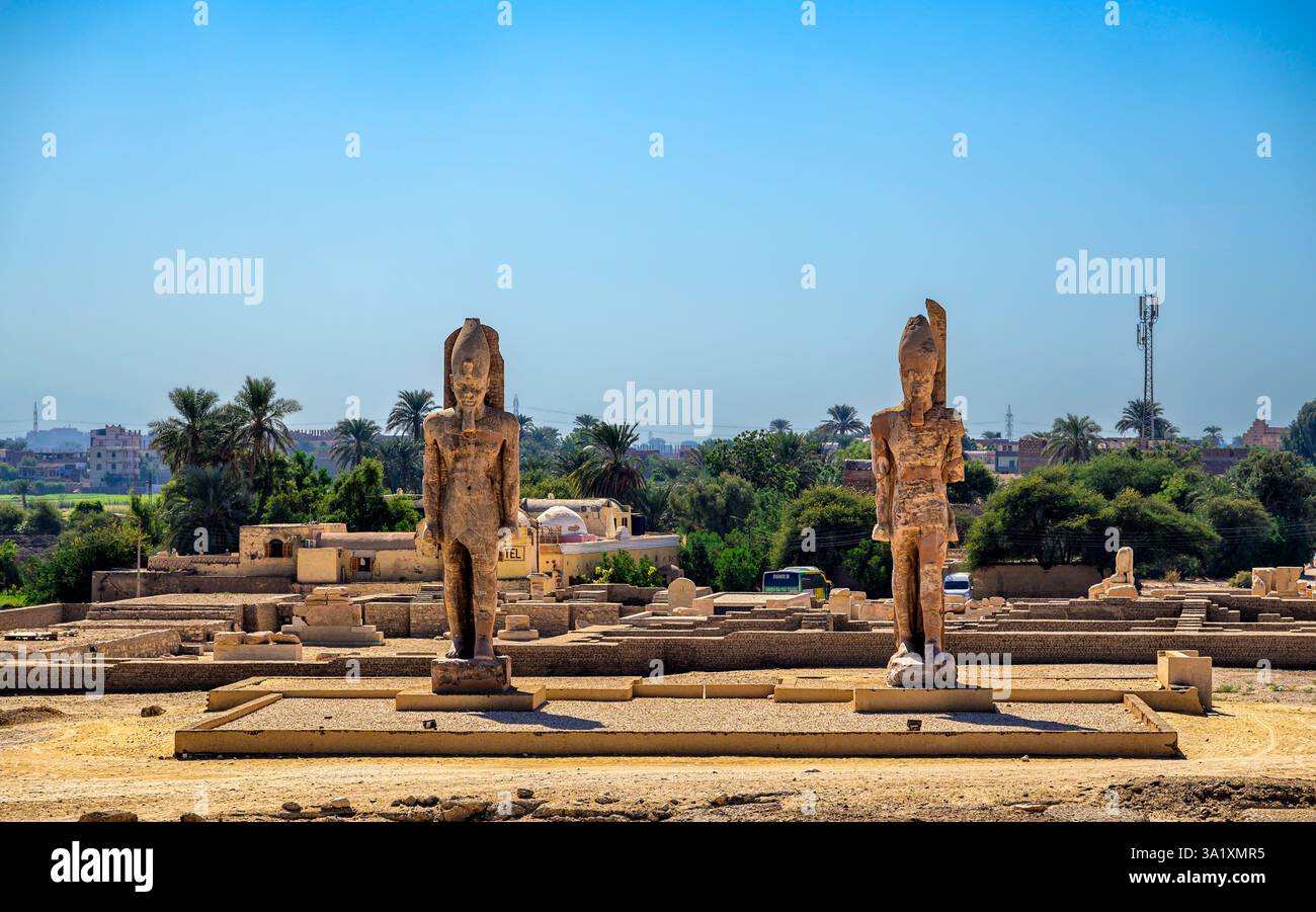 Two 45-foot-tall statues of the pharaoh Amenhotep III that once flanked ...